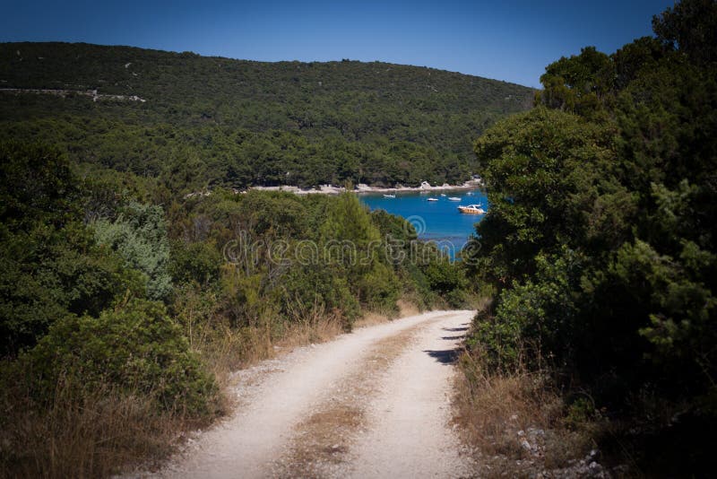 Island path to sea stock image. Image of hill, beach - 33146451