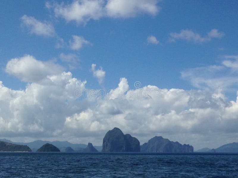 Island scene stock photo. Image of daytime, water, islet - 80053522