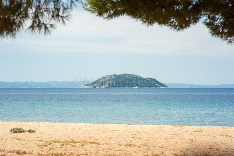 Island by the Sea at Sunset Overlooking the Beach Stock Image - Image ...
