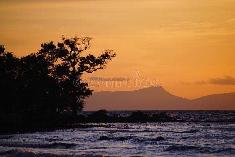 Island sunset stock photo. Image of ocean, reflection - 11673064