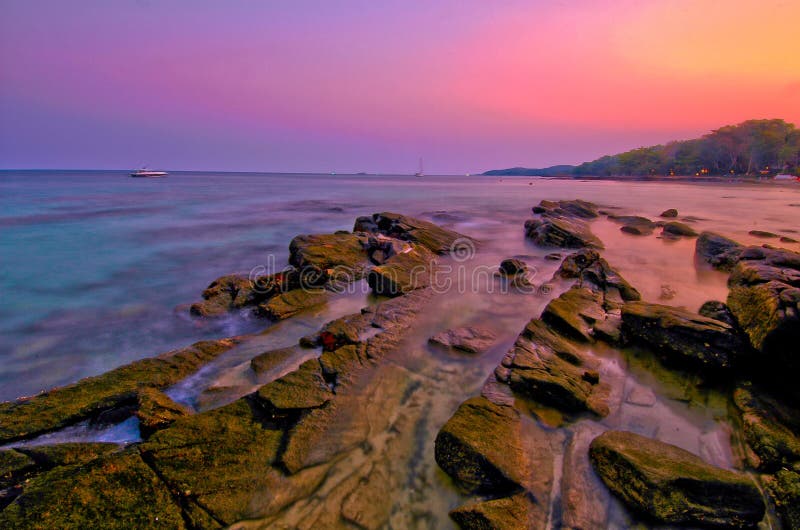 Island sunset stock photo. Image of beach, samed, purple - 42563302