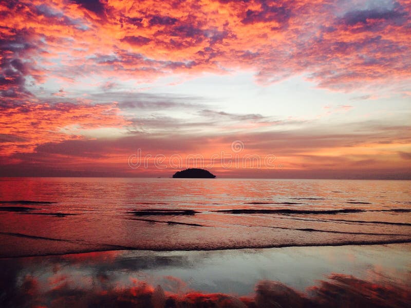 Island Sunset stock image. Image of beautiful, sunset - 49814595