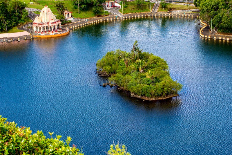 Island with Tropical Greenery in the Blue Lake Stock Photo - Image of ...