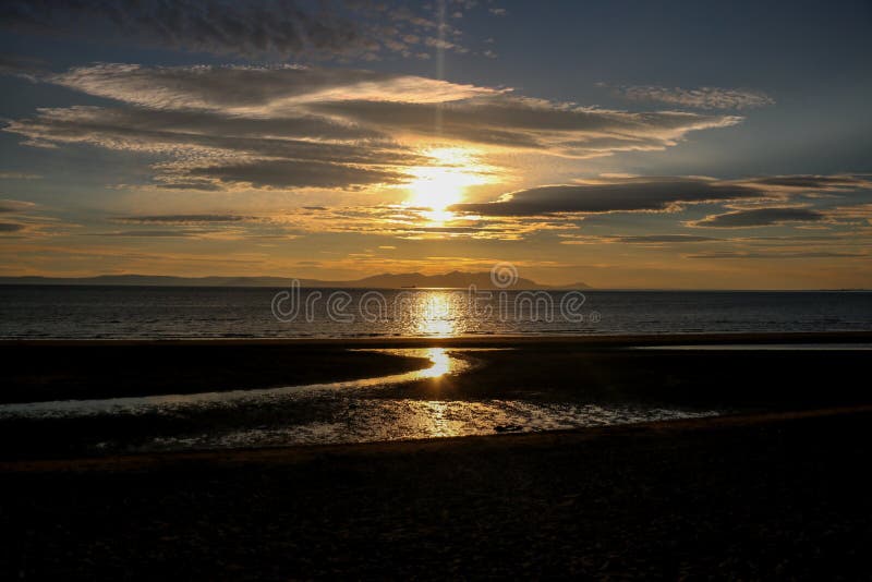 Isle of Arran from Aye Beach at Sunset Stock Photo - Image of nature ...