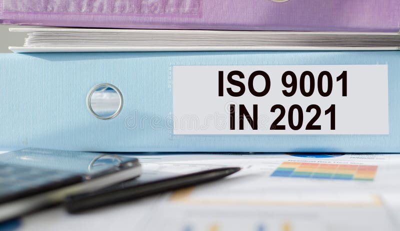 ISO 9001 in 2021 Text Written on Folder with Documents and Calculator ...