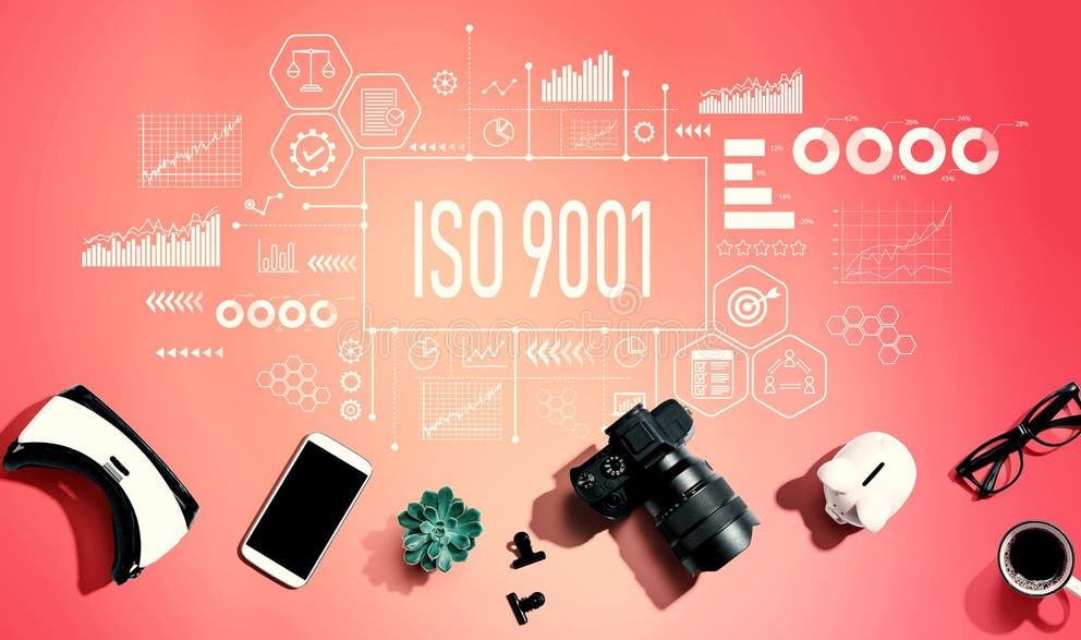 ISO 9001 Theme with Electronic Gadgets and Office Supplies Stock Photo ...