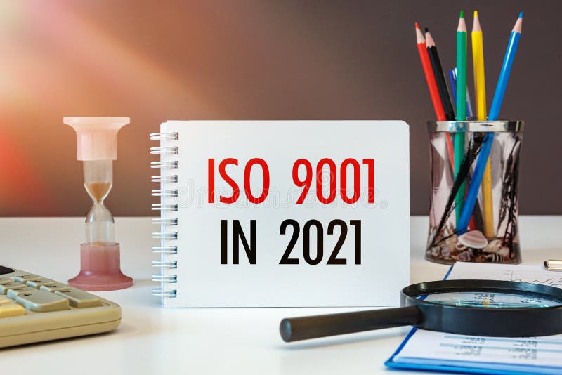 ISO 9001 in 2021 is Written on a Notepad on an Office Desk Stock Image ...
