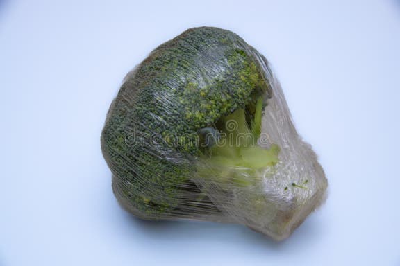 Isolated Broccoli Wrapped into Plastic Stock Photo - Image of veggie ...