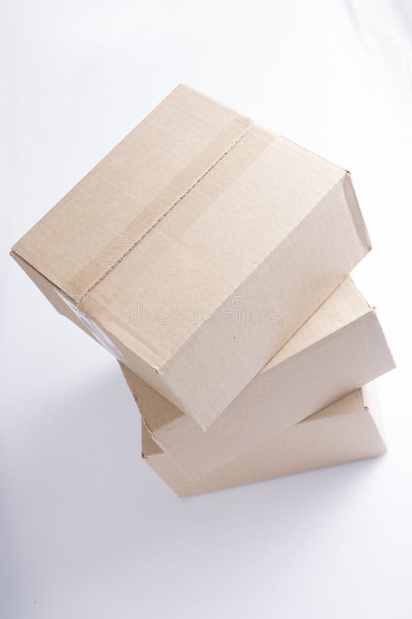 Close Up Shot of Three Stacked Closed Rectangular Blank Brown Carton ...