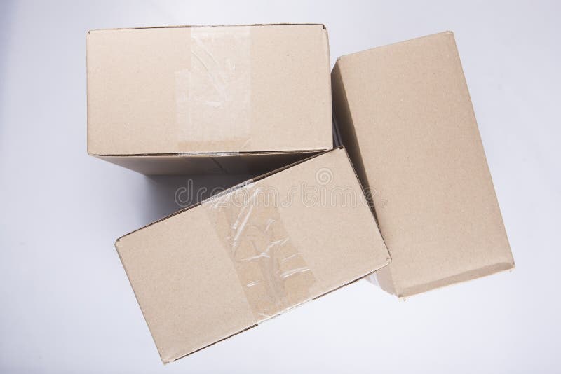 Closed Rectangular Cardboard Box with Corrugated Cardboard Lid, on Oak ...