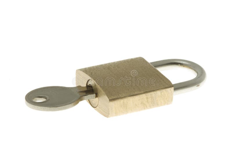 Isolated Closed Brass Padlock With Key Inside Picture. Image: 3918605