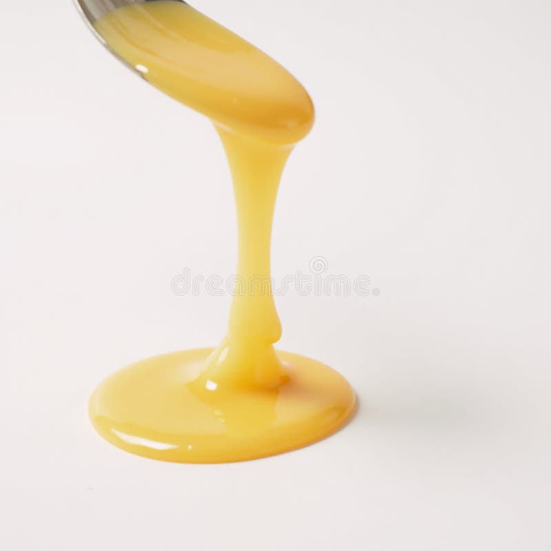 Isolated Closeup Melted Yellow Cheese with Splashes Against a White ...
