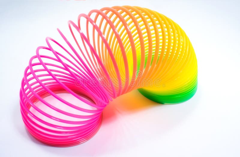 Blue Flexible Slinky Spring Editorial Photography - Image of abstract ...