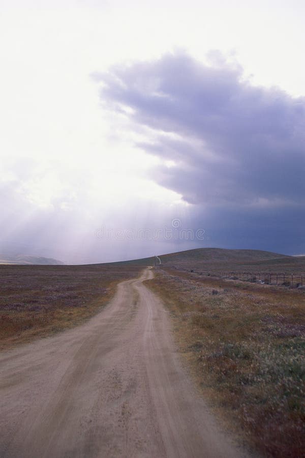 Isolated dirt road stock image. Image of scenic, storm - 23163009