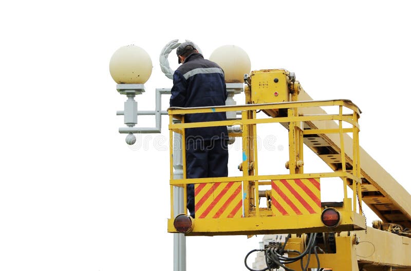 Isolated Electrical Worker Repairing the Wires on the Pole with the ...
