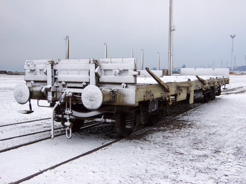 An Isolated Empty Freight Wagon Covered with Snow Stock Photo - Image ...