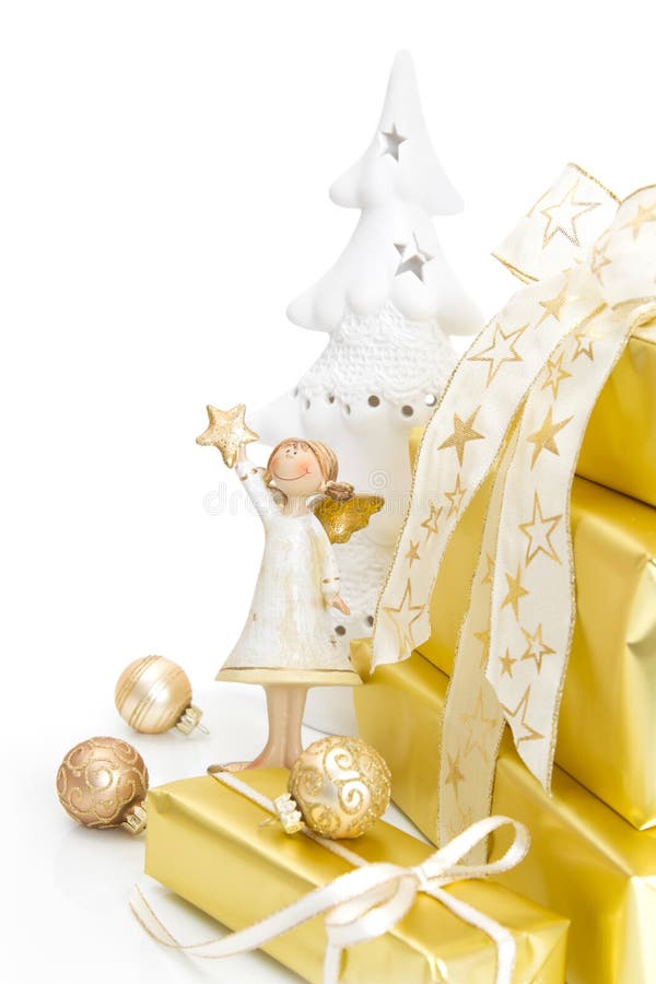 Isolated Gift Boxes for Christmas in Gold with an Angel Stock Photo ...