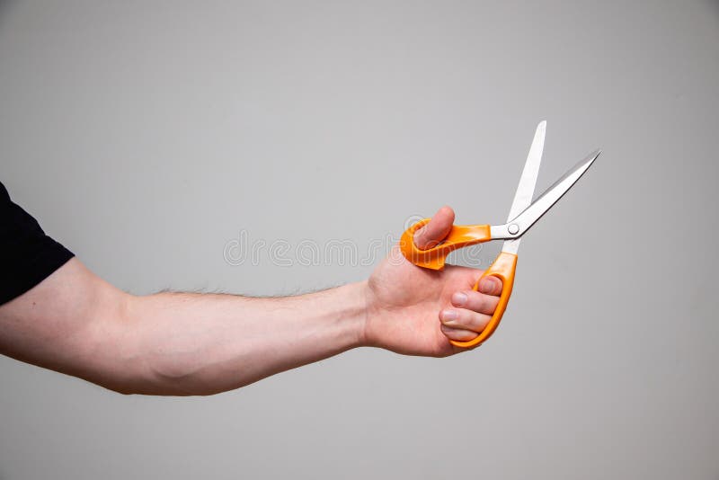 Isolated Hand Holding a Pair of Scissors Stock Image - Image of ...