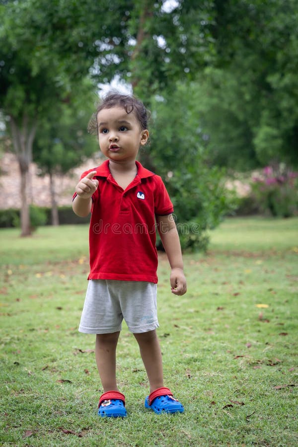 Isolated Indian Kid Walking at Outdoor Park at Evening from Flat Angle ...