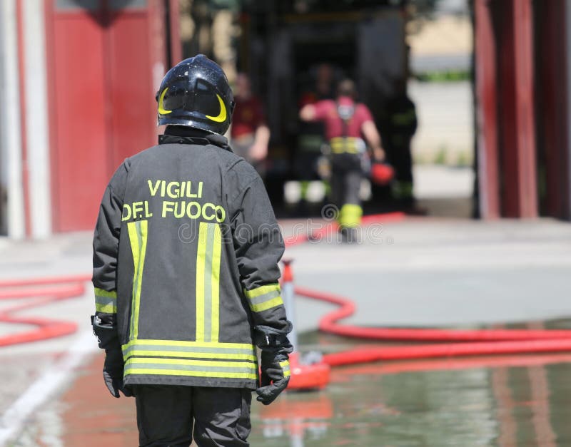 Isolated Italian Fireman with Protective Uniform Stock Photo - Image of ...