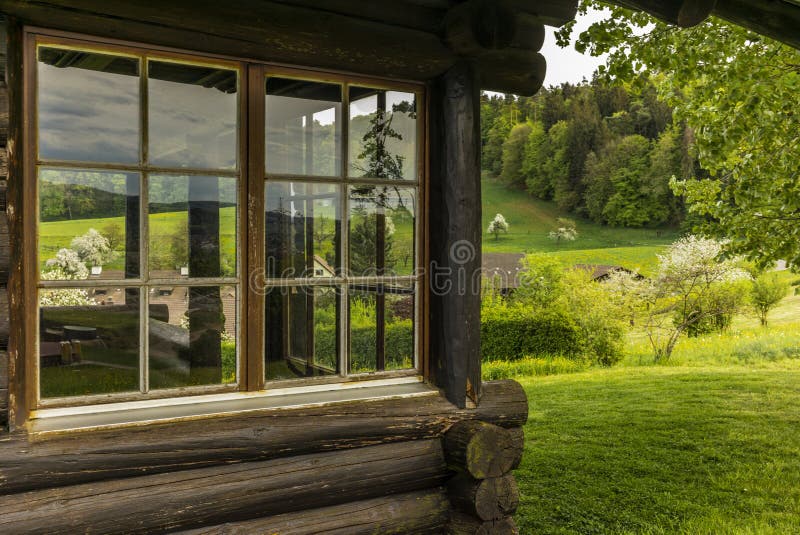 An Isolated Old Log Hut in the Shadow of a Oak Tree in Switzerland ...