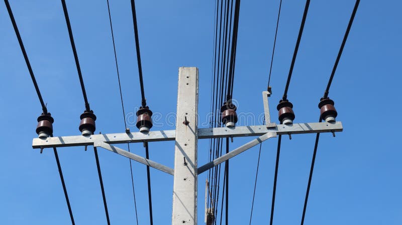 Isolated Overhead Power Lines Against Blue Sky Stock Photo - Image of ...
