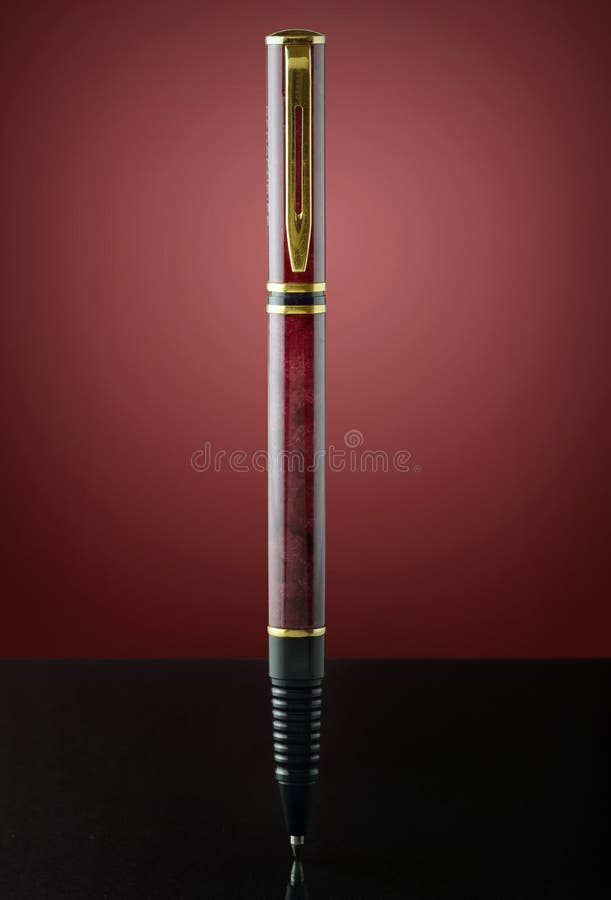 Isolated Red and Golden Pen Stock Photo - Image of black, isolated ...
