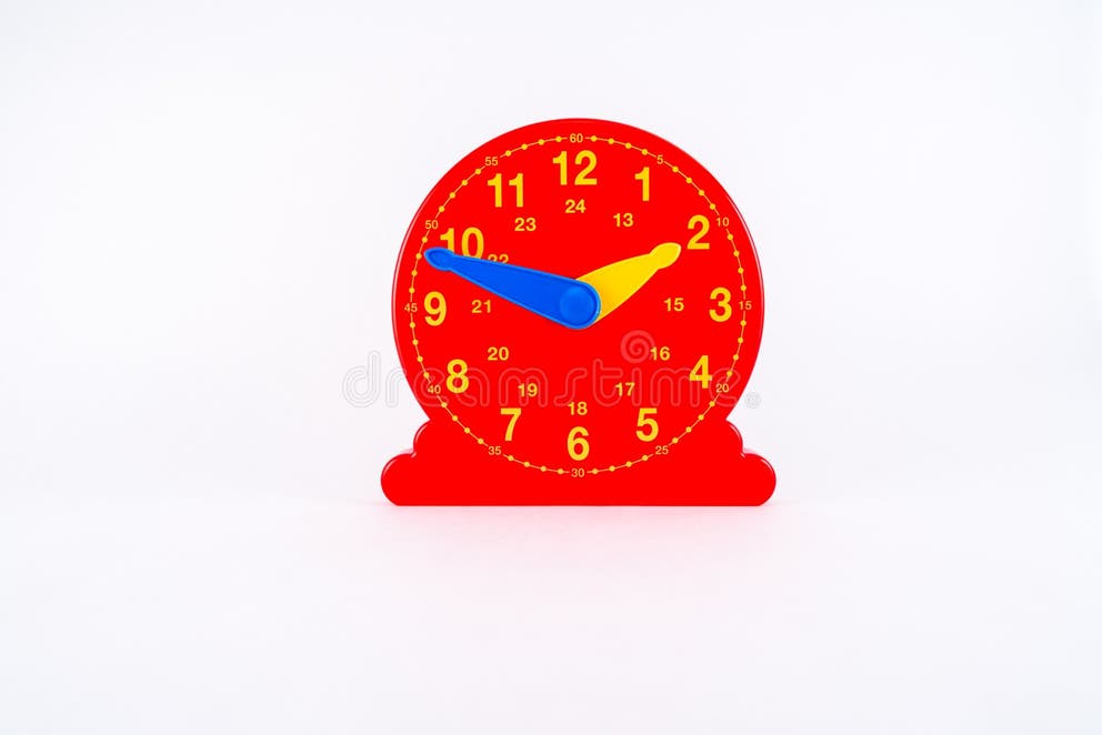 Isolated Red Plastic Clock Toy for Learning Time. Stock Photo - Image ...