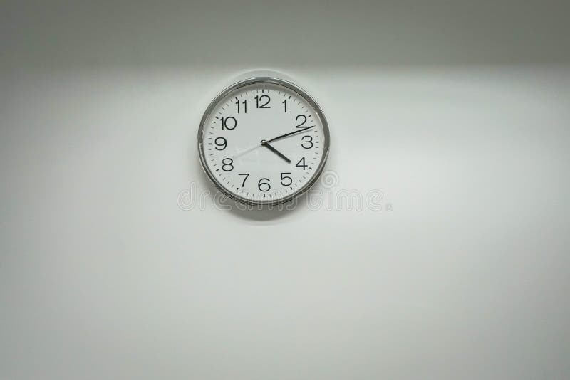 Isolated Round Clock on Office Wall for Timing in Workplace Stock Photo ...