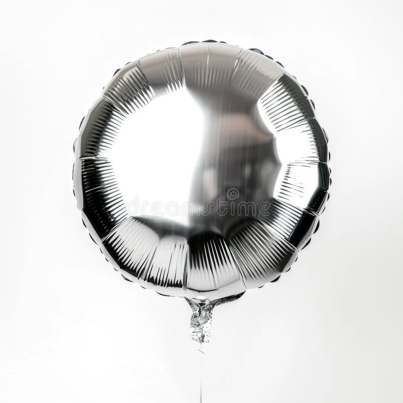 An Isolated Shiny Silver Round Balloon Captures the Light with Its ...