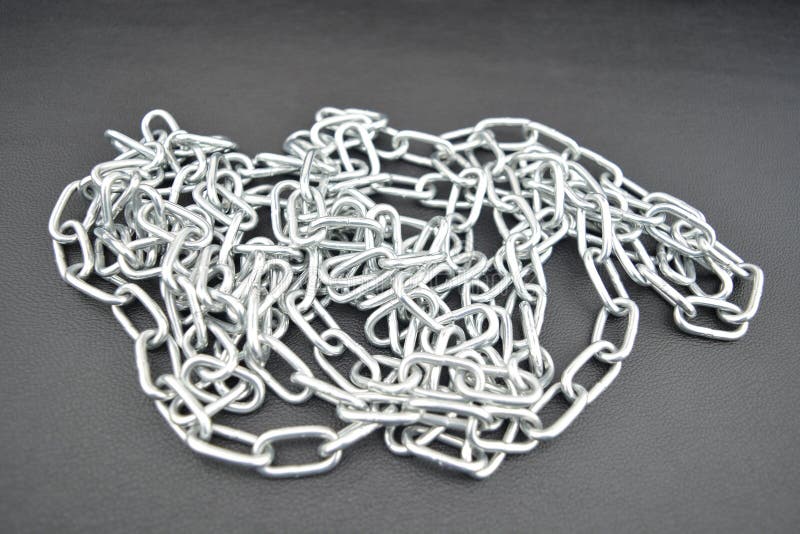 Isolated Silver Long Chain with Small Cells on Black Background Stock ...