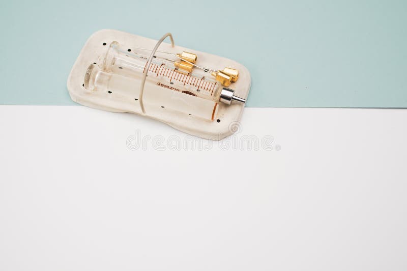 Isolated Sterilized Glass Injection Syringe in a Box on a Blue Stock ...