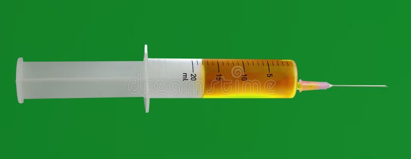 Syringe with yellow liquid stock photo. Image of instrument - 12845220