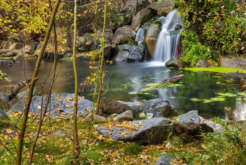 Isolated Waterfall with Autumn Colors Stock Photo - Image of water ...