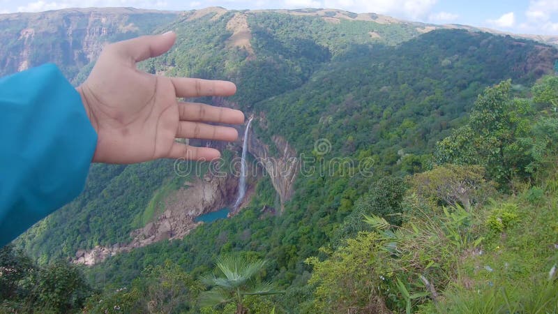 Isolated Waterfall Falling from Mountain Top Nestled in Green Forests ...