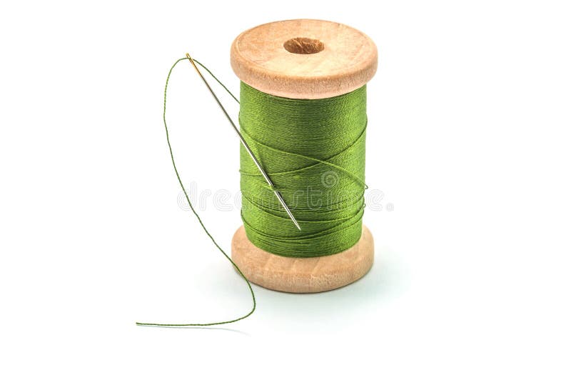 Isolated Wooden Spool of Green Thread and Needle Stock Photo - Image of ...