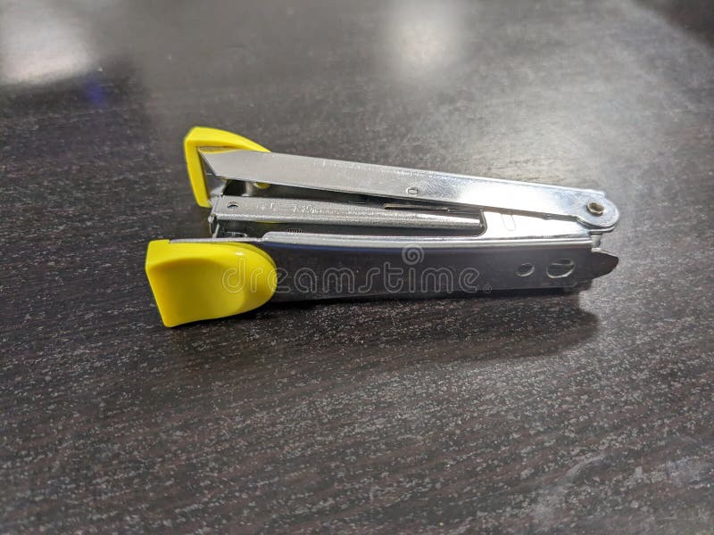 Isolated Yellow Stepler on the Table in the Office Stock Photo - Image ...