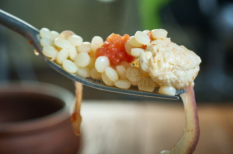 Israel One Pot Garlicky Ptitim Stock Photo - Image of grilled, salad ...