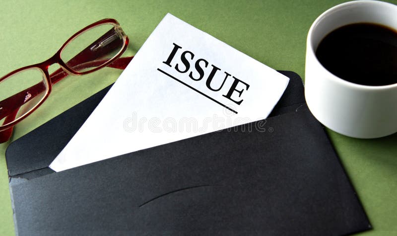 ISSUE - Word on a White Sheet of Paper on a Background of a Black ...
