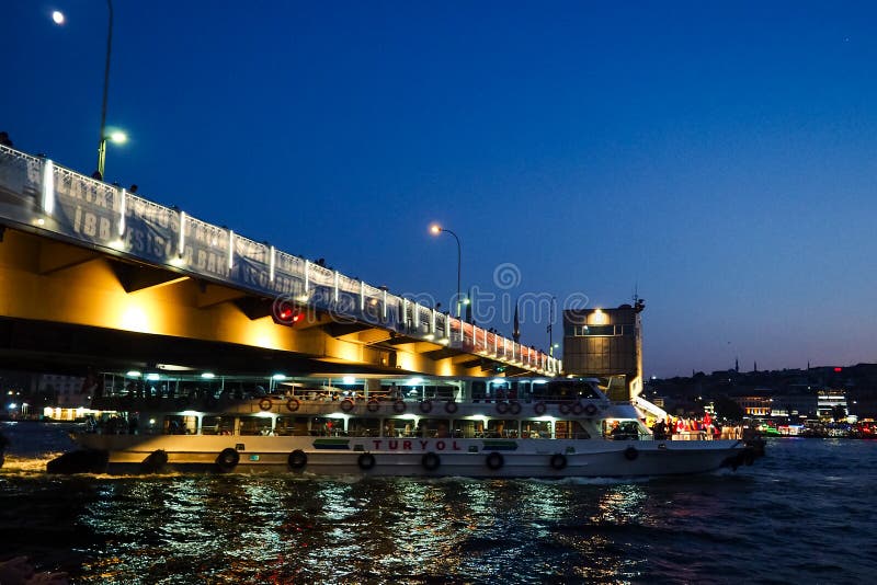 ISTANBUL, TURKEY - AUGUST 21, 2018: Ferry Under Galata Bridge Editorial ...