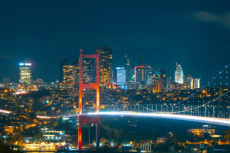 Istanbul View at Night. Bosphorus Bridge with Skyscrapers Stock Image ...