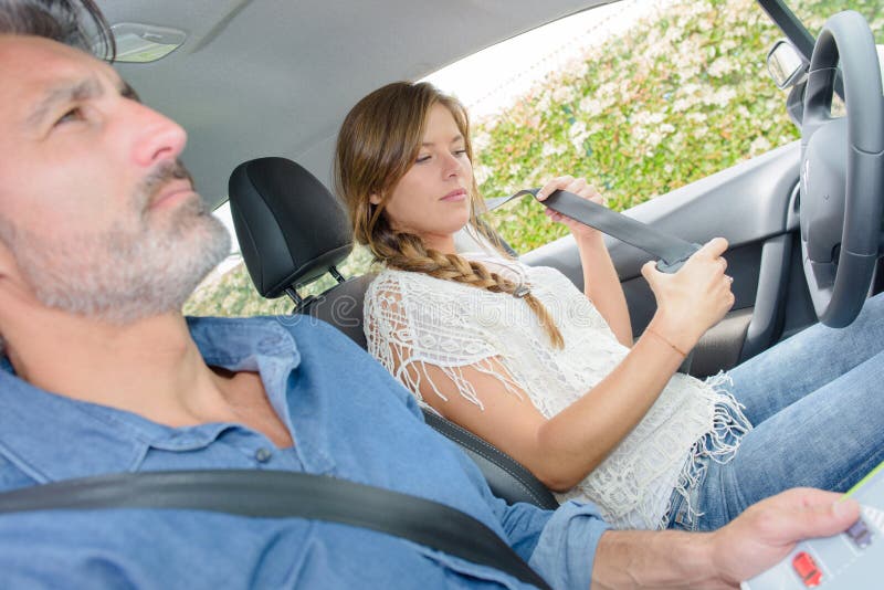 Istruttore Di Guida E Studentessa in Automobile Dell'esame Fotografia ...