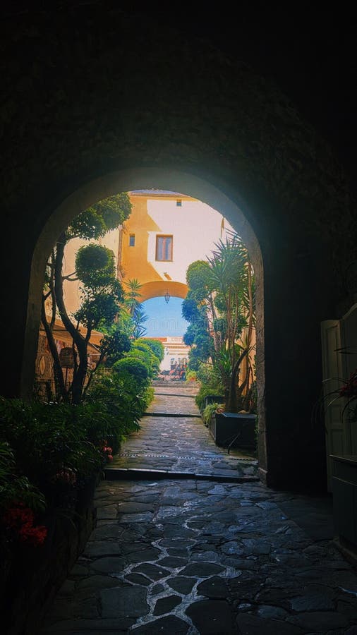 Italian Archway with Coastal Town Stock Photo - Image of hidden ...
