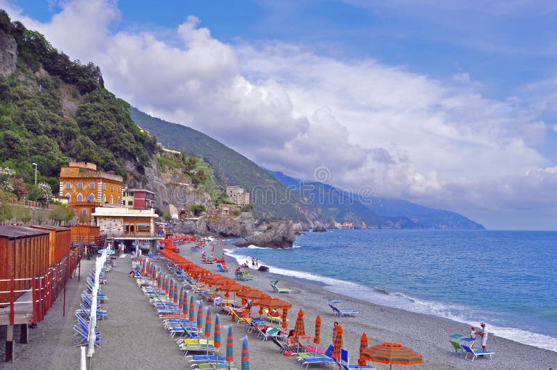 Italian Beach View with Umbrellas and Sunbeds. Summer Day on the Beach ...