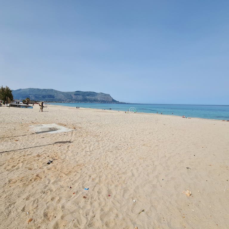 Italian beach at sunset stock image. Image of ocean - 375577937
