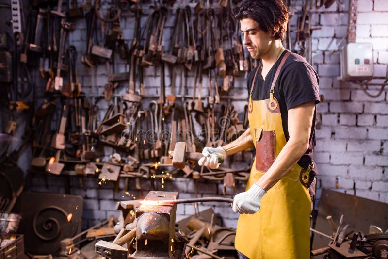 Italian Brunette Man Blacksmith Working in the Workshop Stock Photo ...