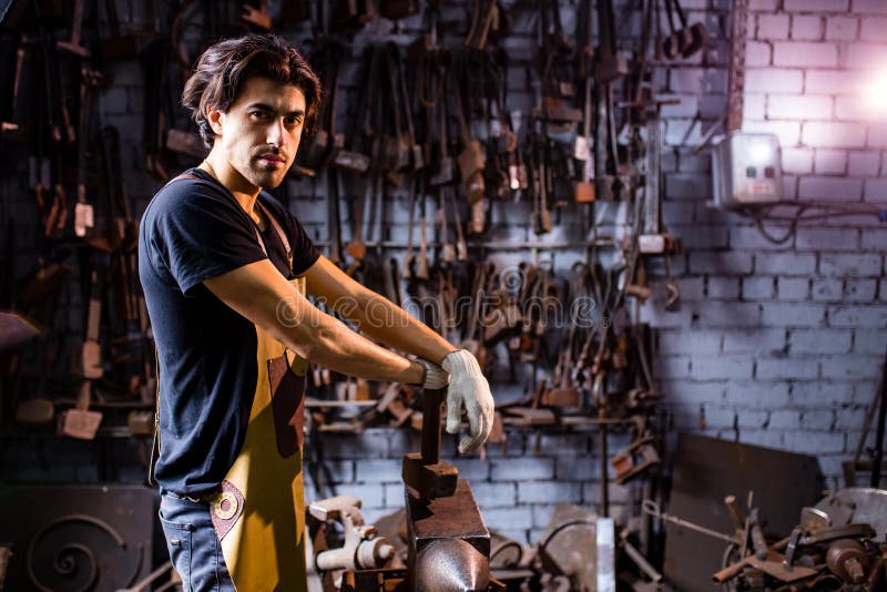 Italian Brunette Man Blacksmith Working in the Workshop Stock Image ...