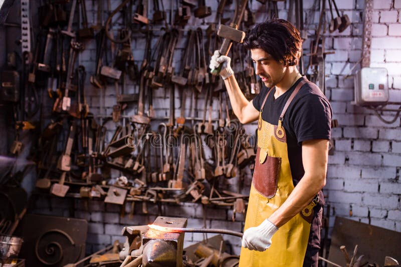 Italian Brunette Man Blacksmith Working in the Workshop Stock Image ...