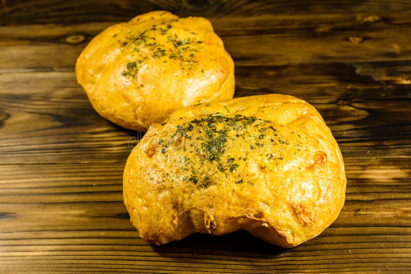 Italian Bun Ciabatta with Garlic on Wooden Table Stock Image - Image of ...