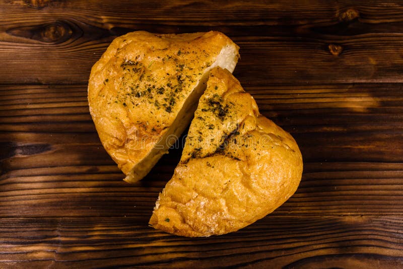 Italian Bun Ciabatta with Garlic on Wooden Table Stock Image - Image of ...